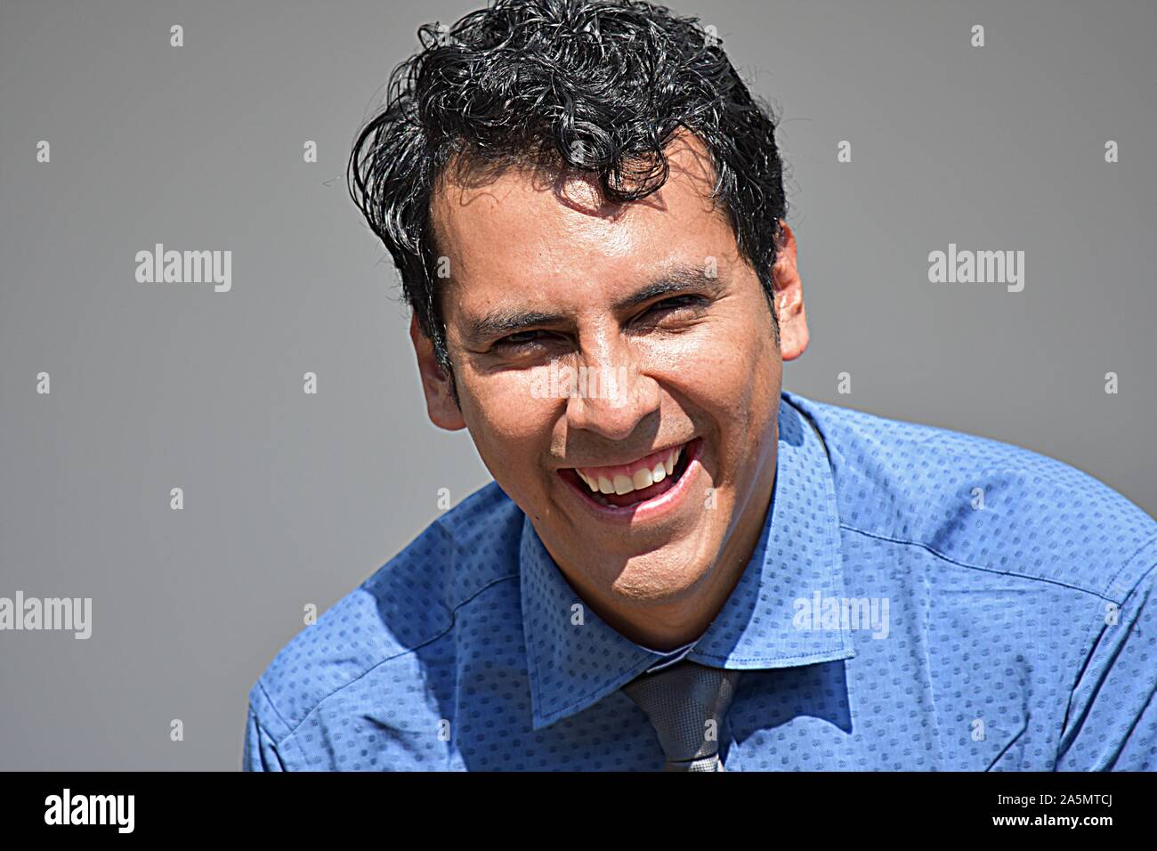Laughing Minority Business Man Wearing Tie Stock Photo - Alamy