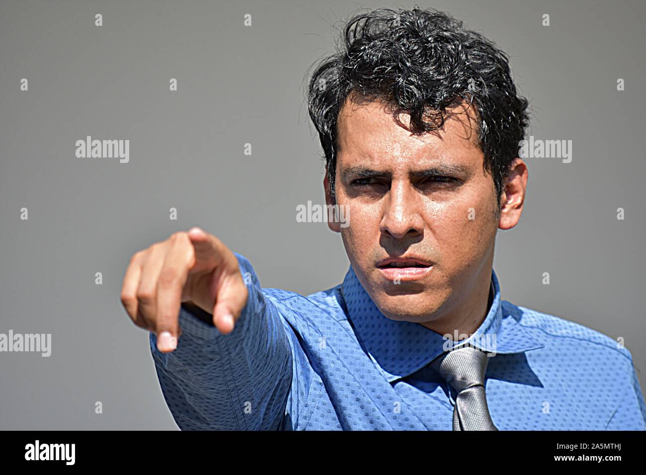 Young Business Man Pointing Stock Photo - Alamy