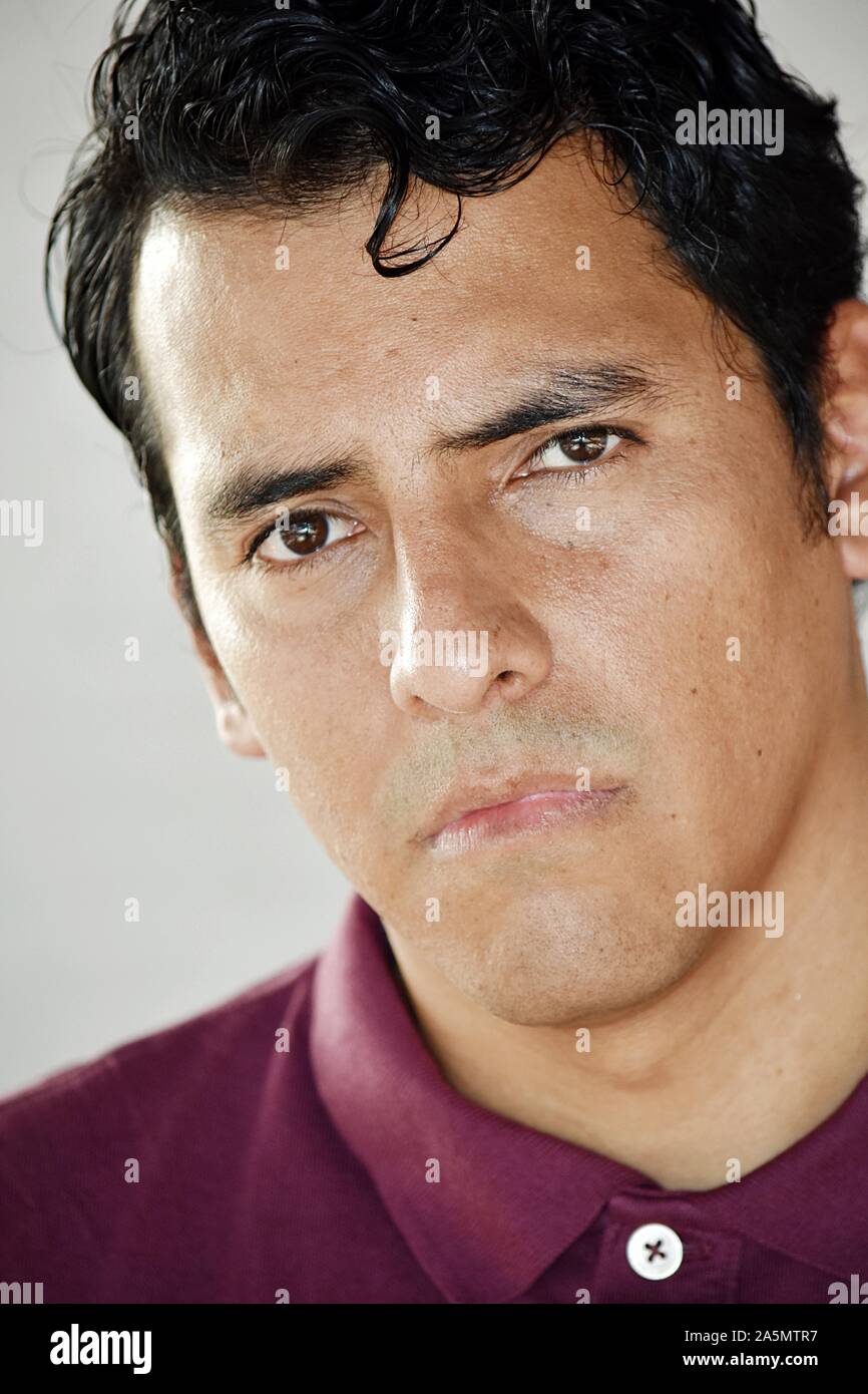An Unemotional Hispanic Male Stock Photo - Alamy