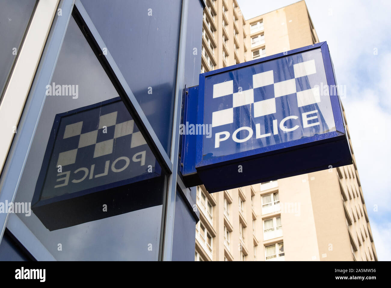 Police Scotland station sign with blue and white chequered pattern ...