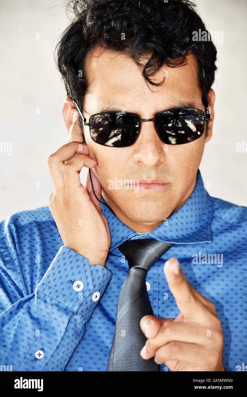Colombian Security Guard Pointing Stock Photo - Alamy
