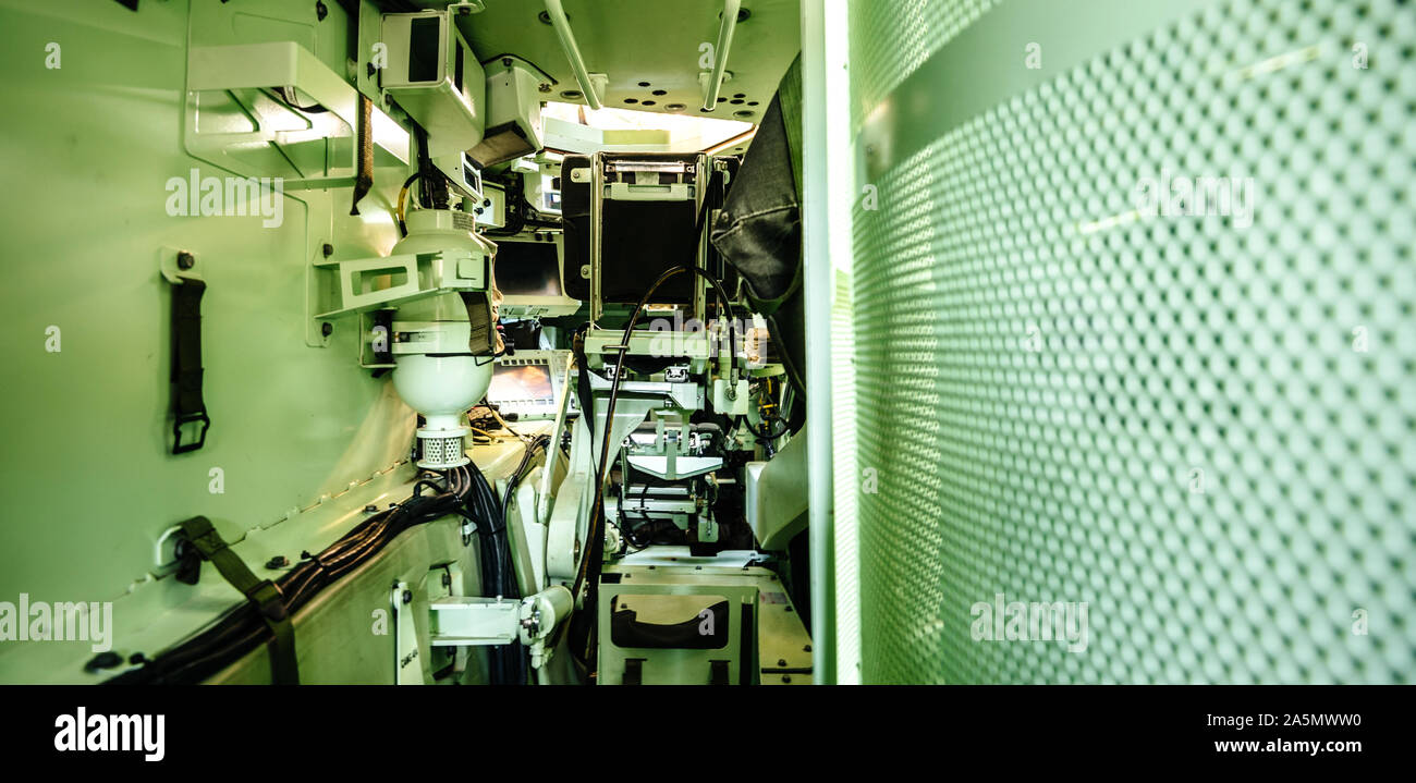 Interior view of empty multi-role armored military vehicle personnel ...
