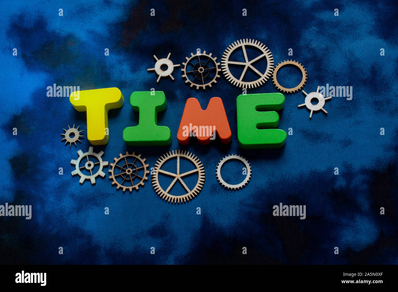 Colorful time wording with gears as time concept Stock Photo - Alamy