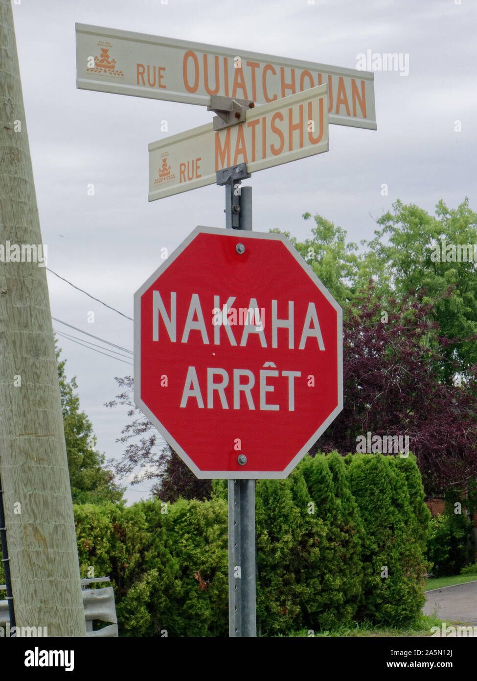 A bilingual Stop sign in Mashteuiatsh Amerindian reserve in Saguenay ...