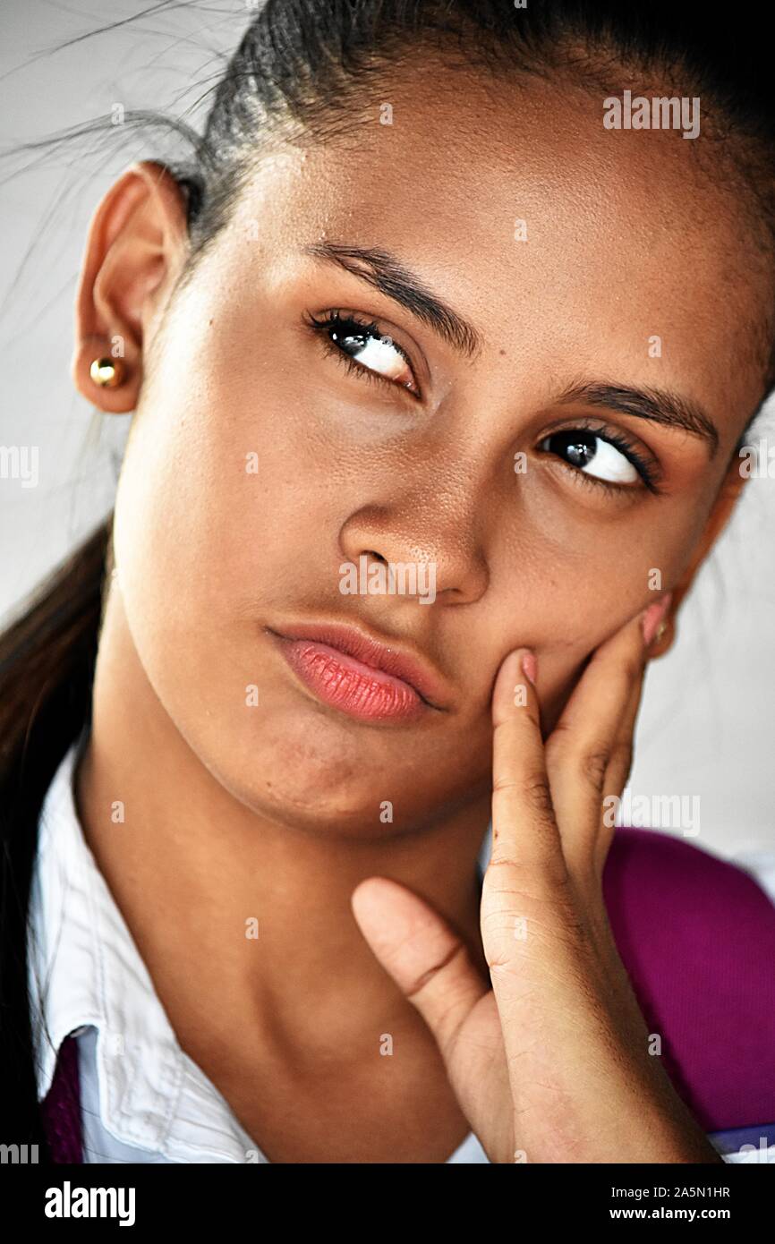 Beautiful Teenage Girl Student Thinking Stock Photo - Alamy