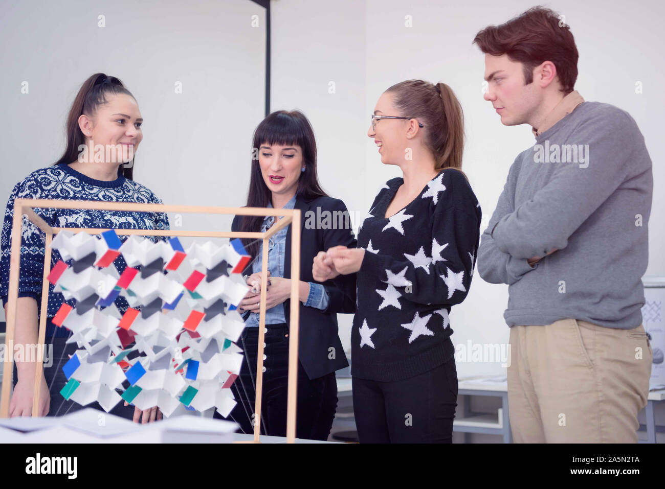 Female Architecture teacher at work. Female professor explain ...