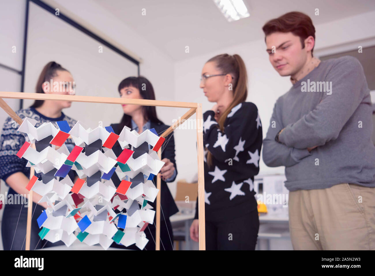 Female Architecture teacher at work. Female professor explain ...