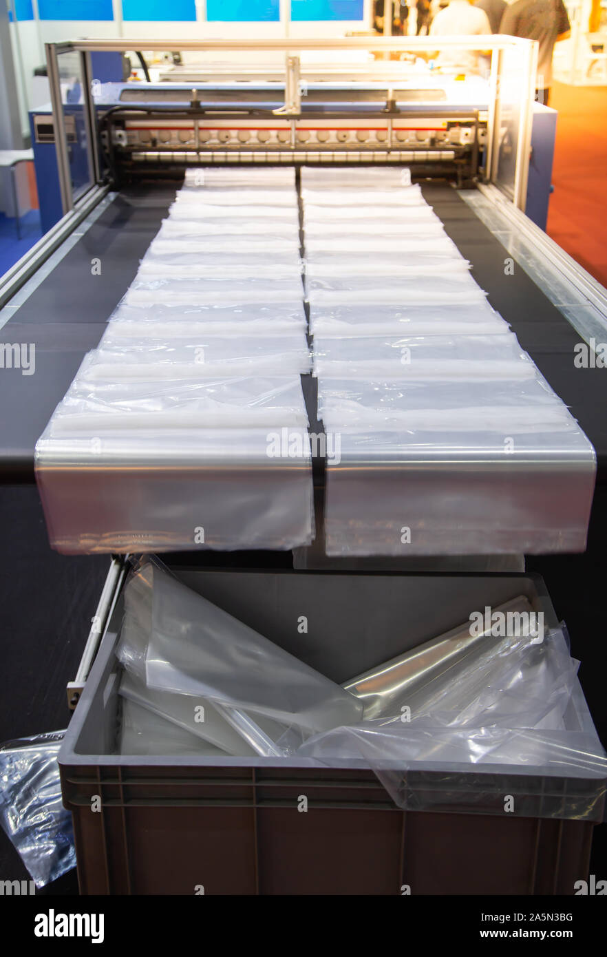 Industry transparent plastic pouch heat sealing machine Stock Photo - Alamy
