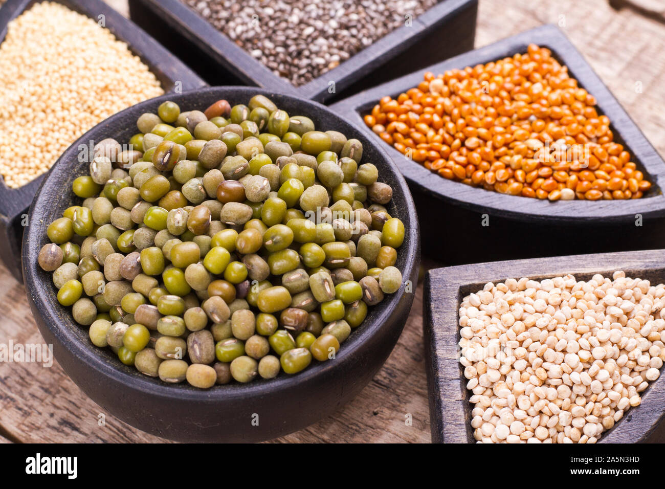 group of grains of super food, chia, amaranth, quinoa, millet and mung ...