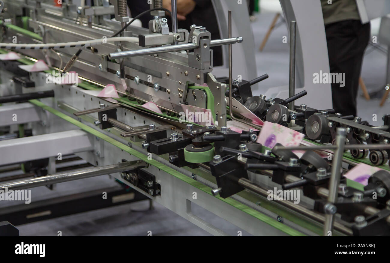 Packaging printing machine from printing to finishing Stock Photo - Alamy