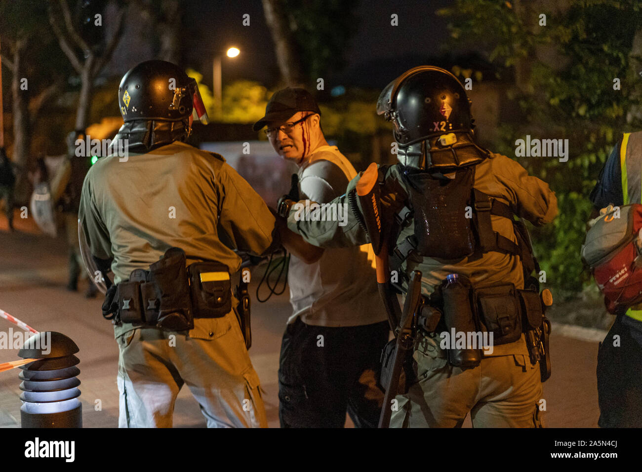 Hong Kong, China. 21st Oct, 2019. A resident is being arrested by the ...