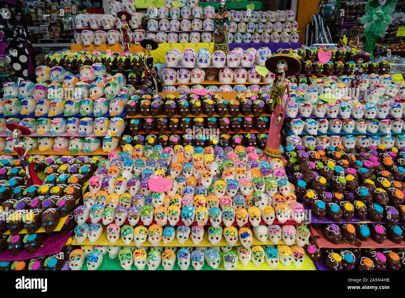 Day of the dead skulls are being displayed at a market stall in Mexico ...