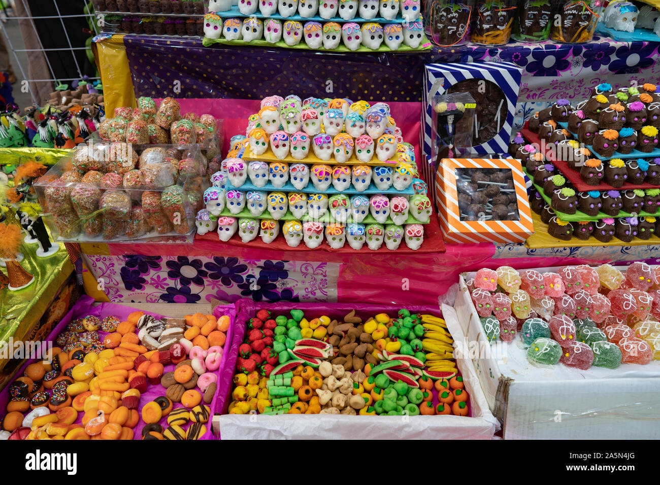 Day of the dead decorations, sweets and chocolates are being displayed ...
