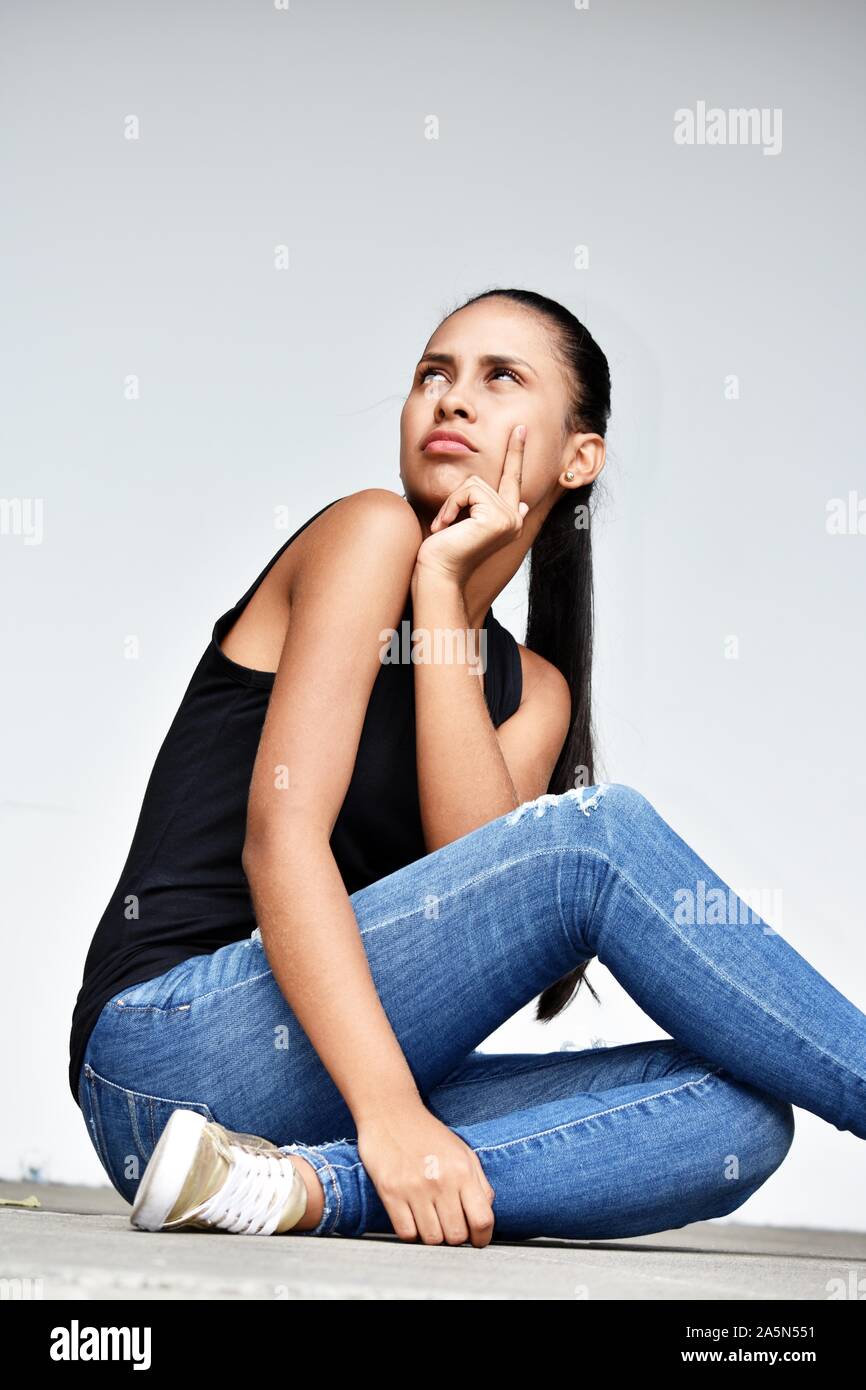 Confused Female Student Wearing Blue Jeans Stock Photo - Alamy