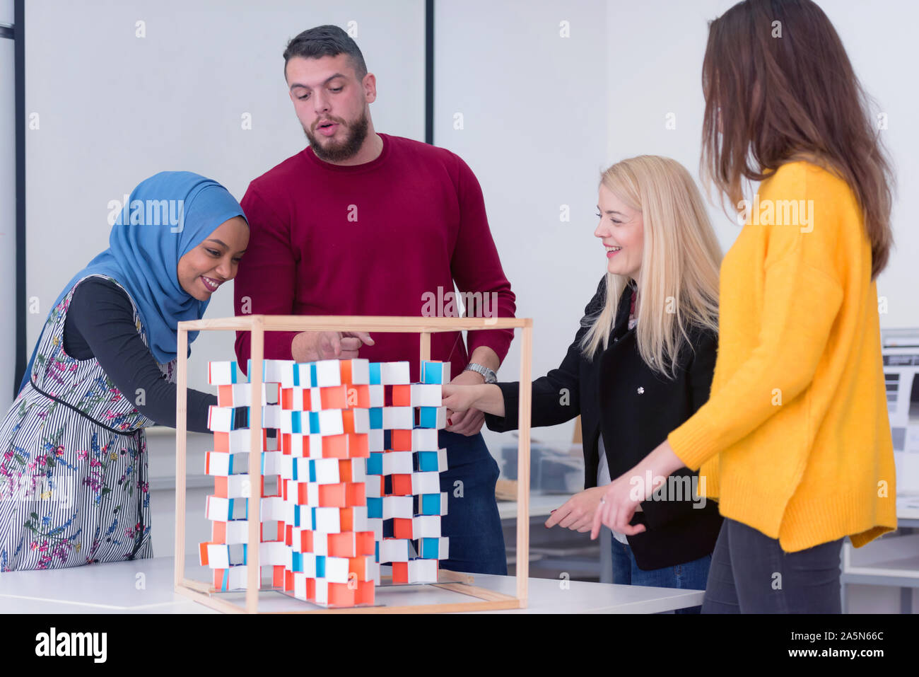 Female Architecture teacher at work. Female professor explain ...