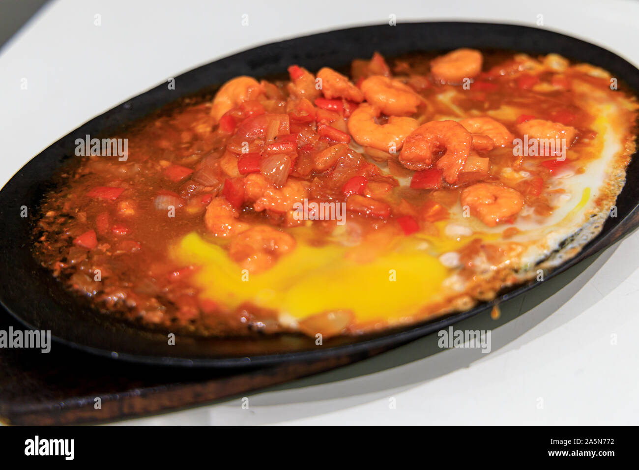 Popular Filipino food Sizzling Gambas, Philippines Stock Photo - Alamy