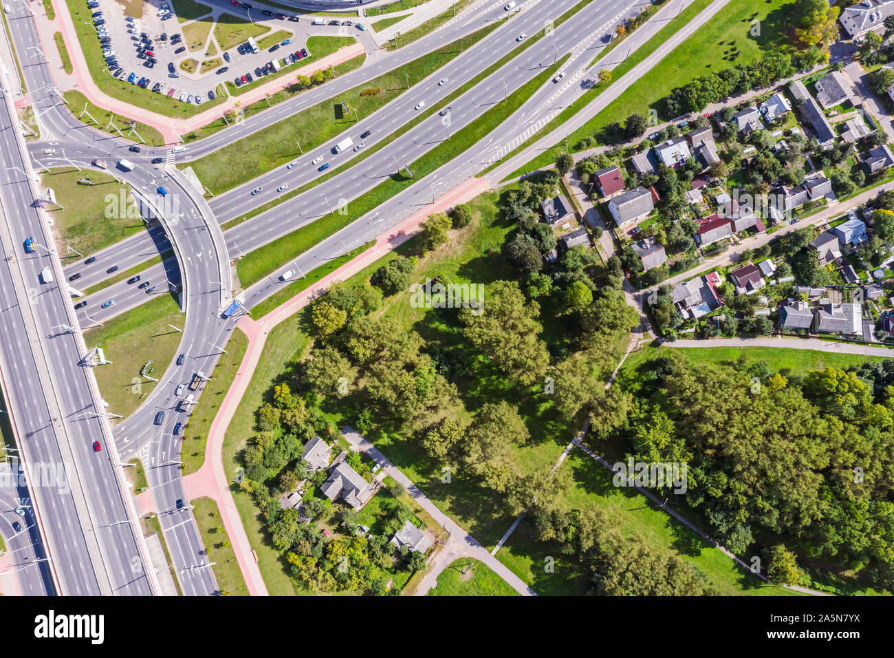 aerial top view of city suburb area in summer day. road roundabout traffic Stock Photo - Alamy