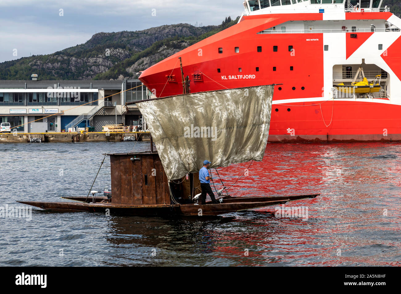 Self-made sailing raft arriving in port of Bergen, Norway. Being ...
