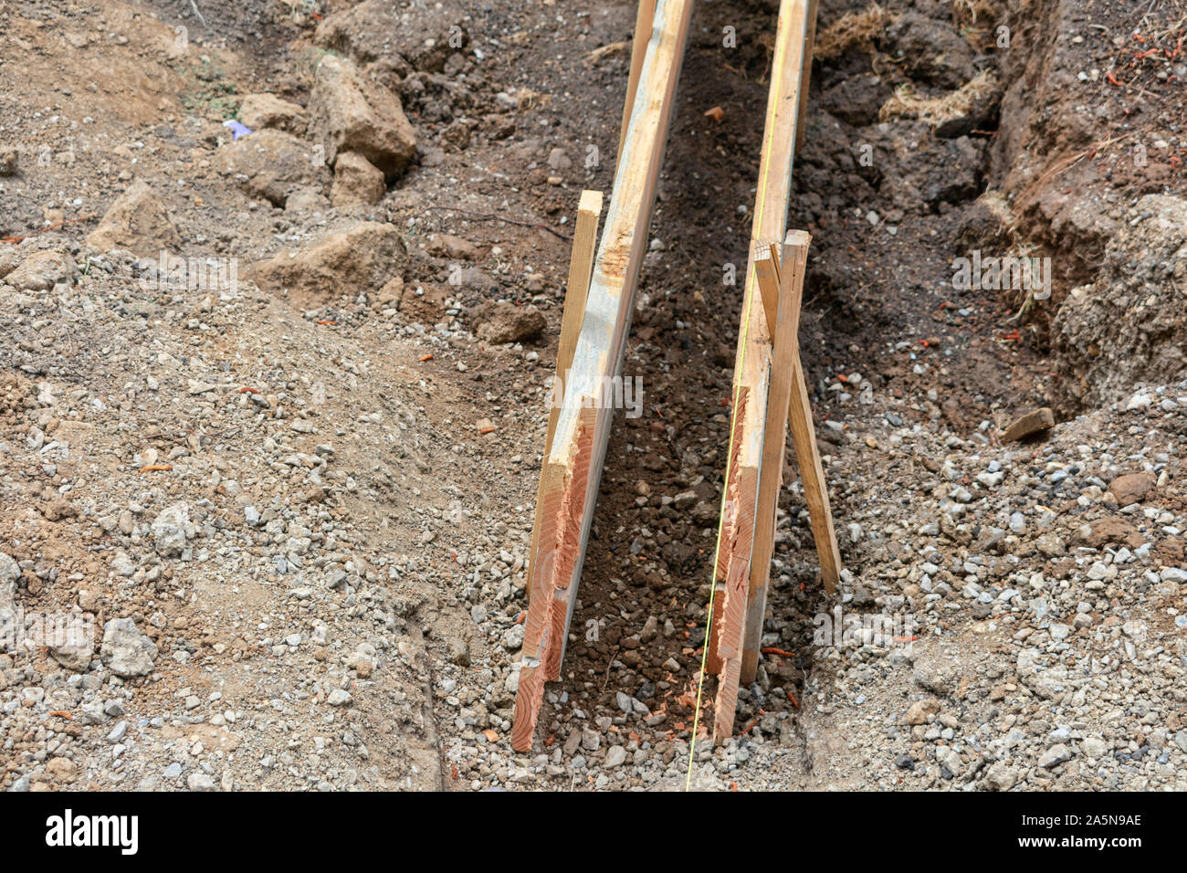 Stakes driven hi-res stock photography and images - Alamy