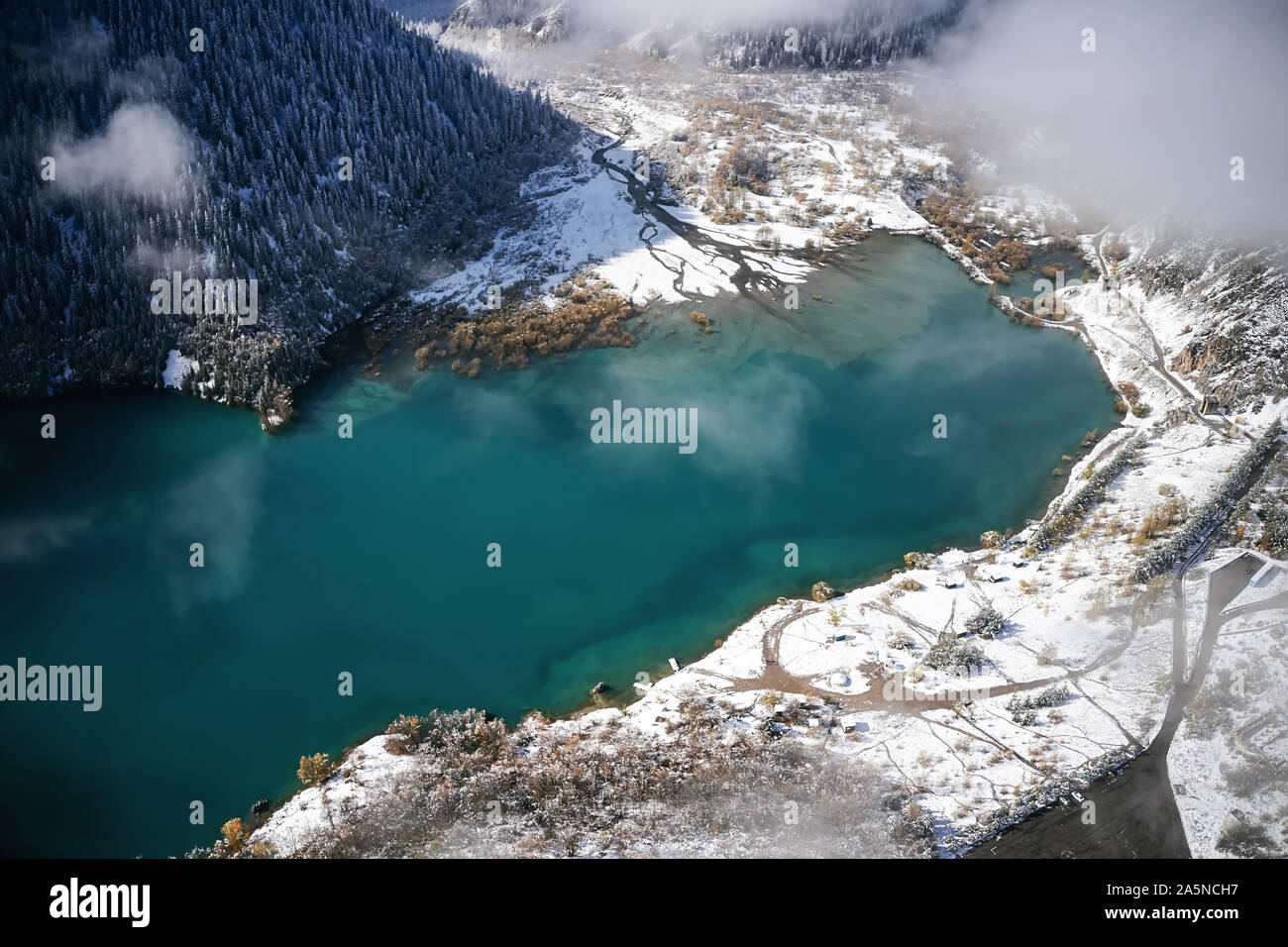 Aerial view of scenic winter landscape at Issyk Lake, Almaty ...