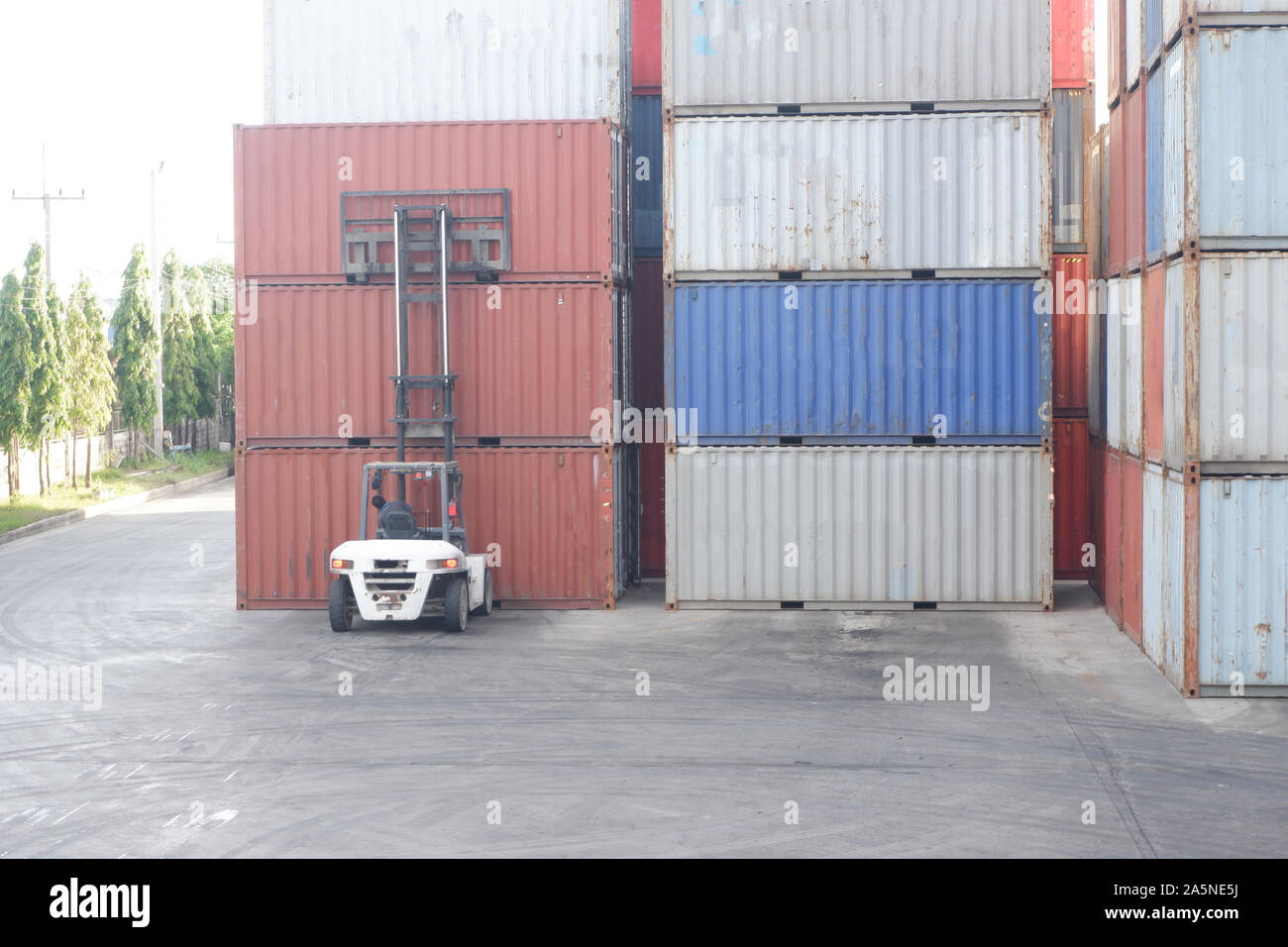 Container handlers Working in the container yard Stock Photo - Alamy