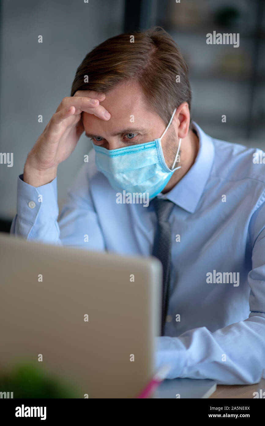 Exhausted businessman working laptop hi-res stock photography and ...
