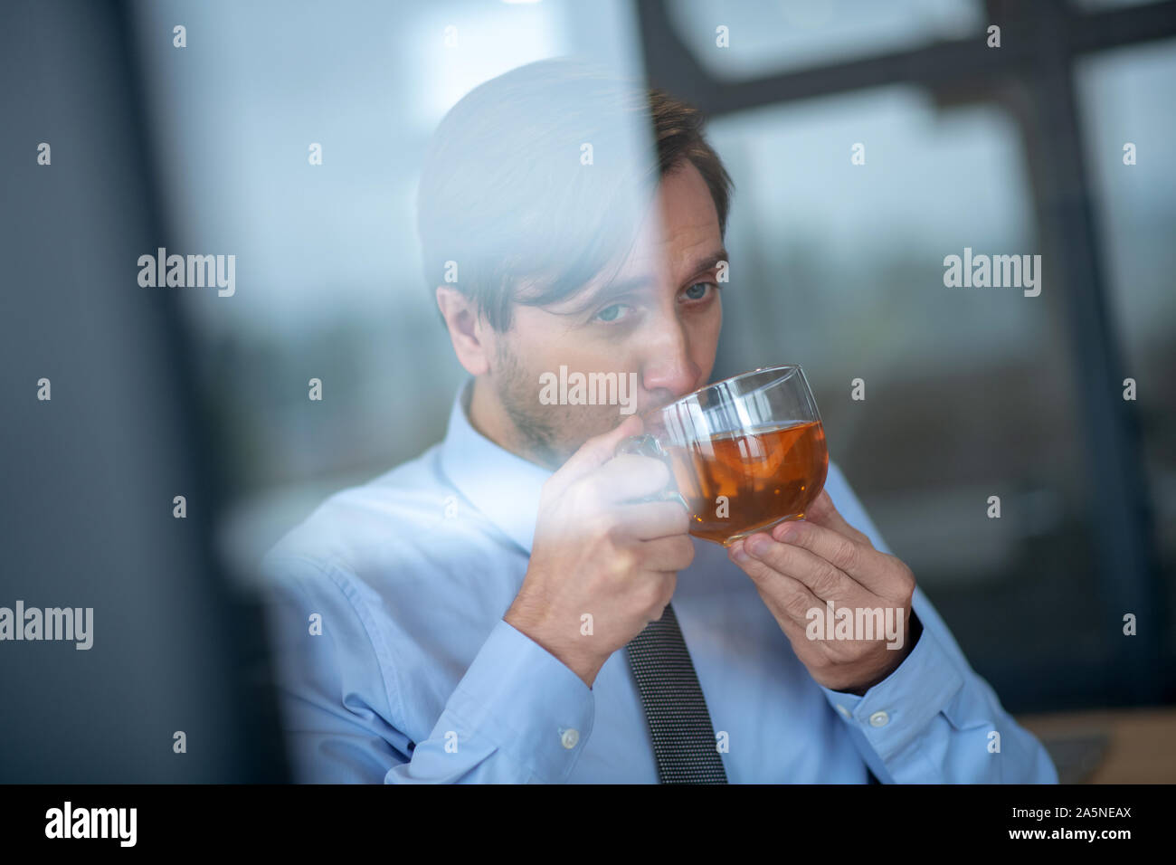 Businessman blue shirt tie joy hi-res stock photography and images - Alamy