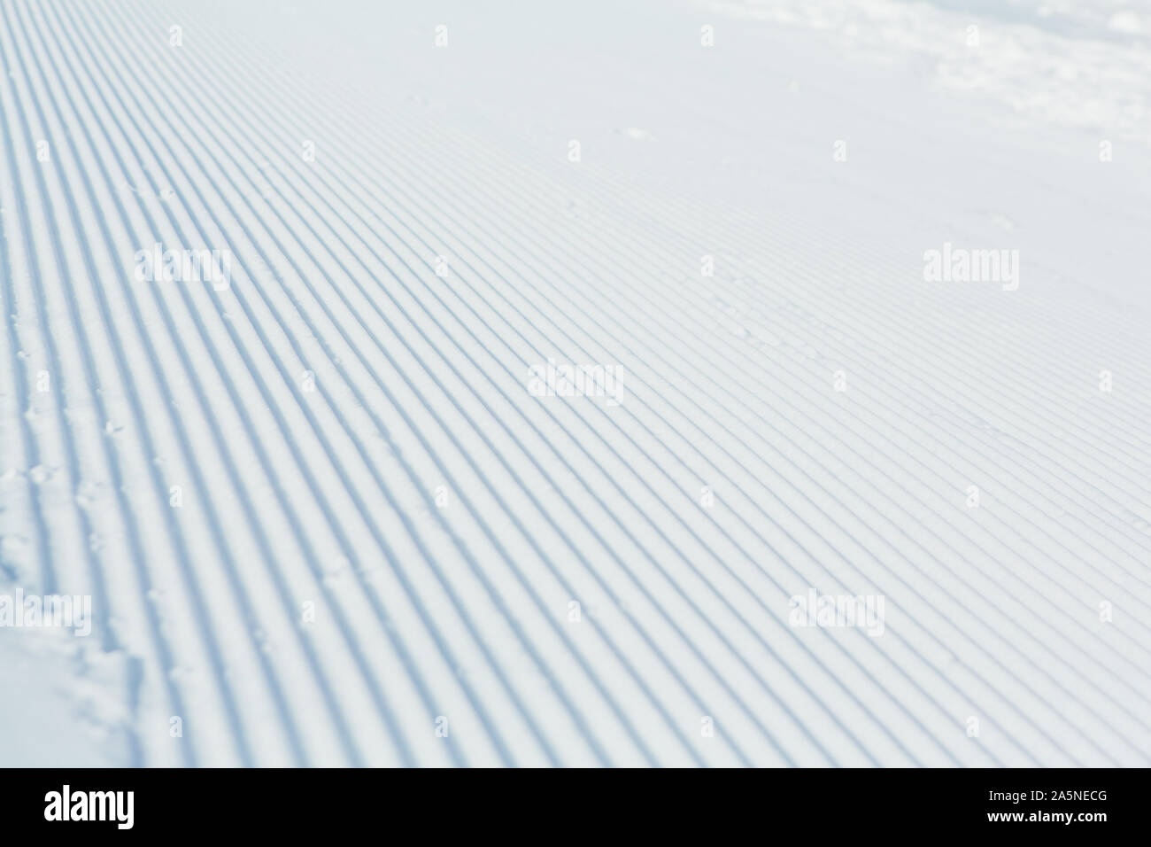 Snow lines made from a snow machine Stock Photo - Alamy