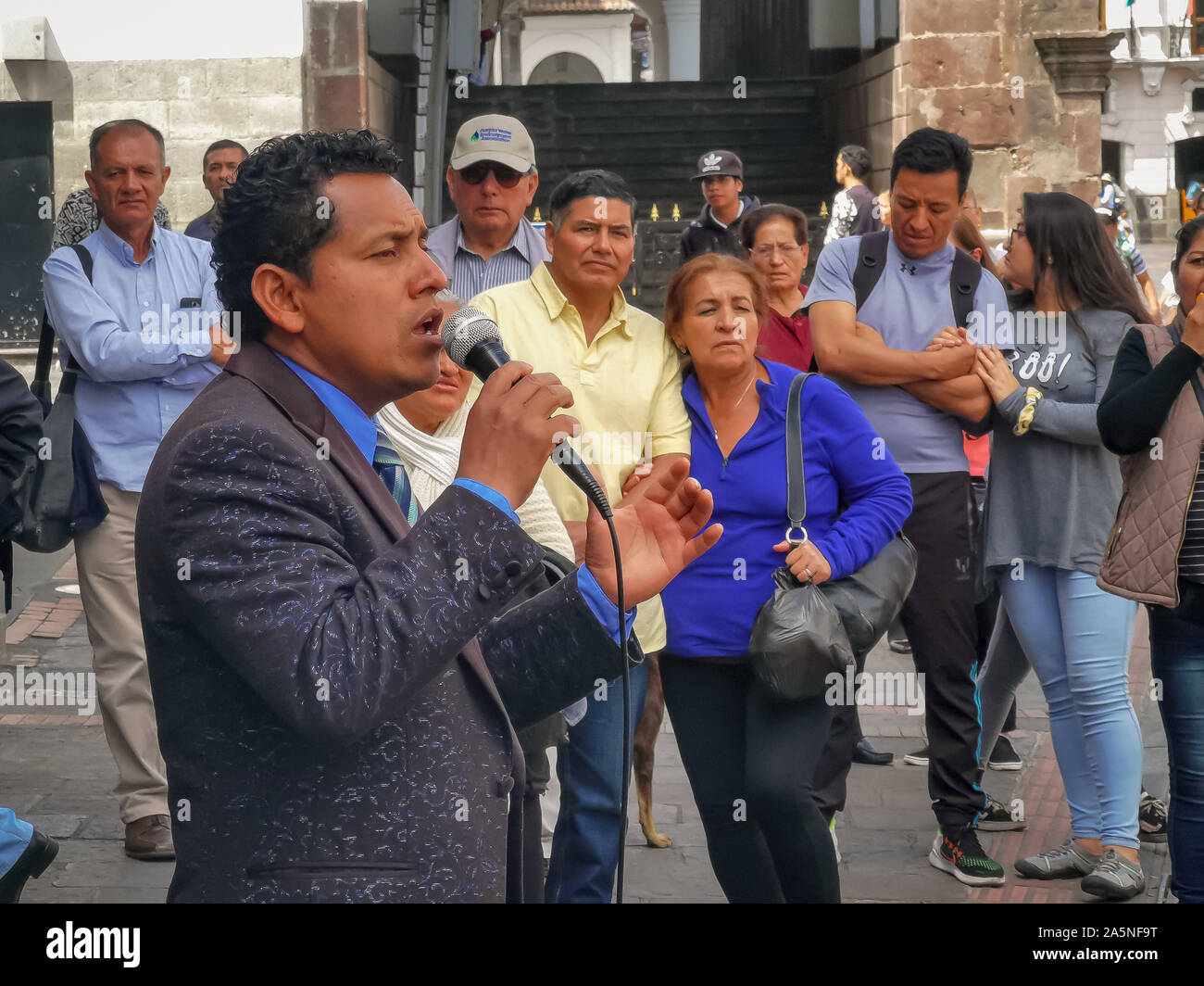 Quito, Ecuador, September 29, 2019: Local singer at the historic centre ...