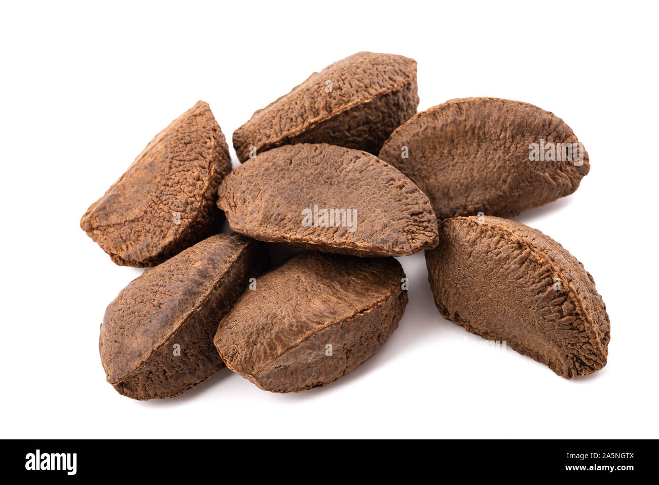 Brazil nuts group isolated on white background Stock Photo - Alamy
