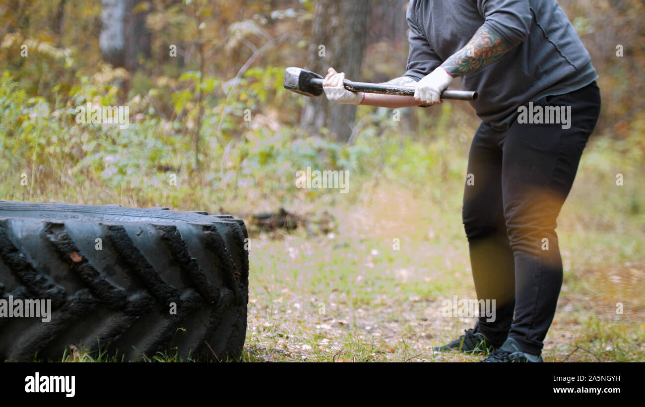 Big man bodybuilder hitting truck hi-res stock photography and images ...
