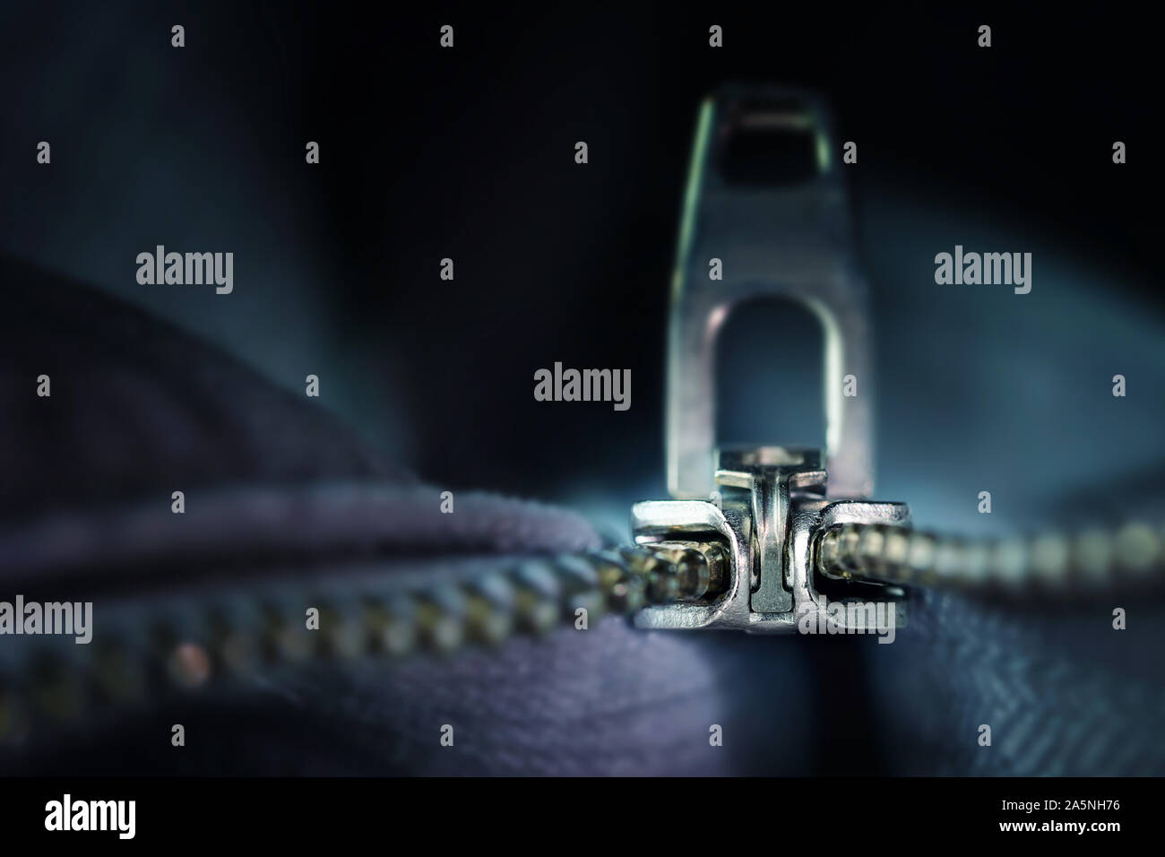 metal zipper macro shot, incisive technical invention for sewing and ...