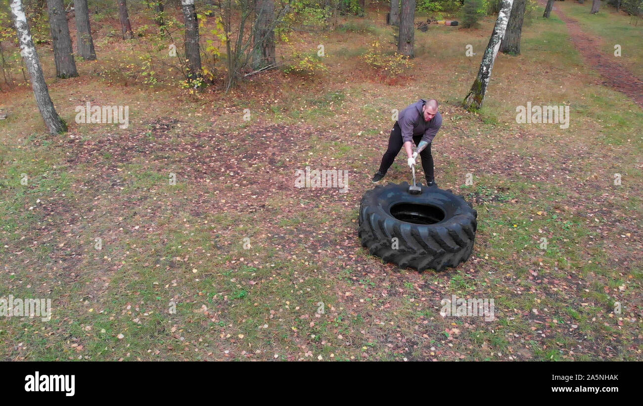 Man bodybuilder hitting truck hi-res stock photography and images - Alamy