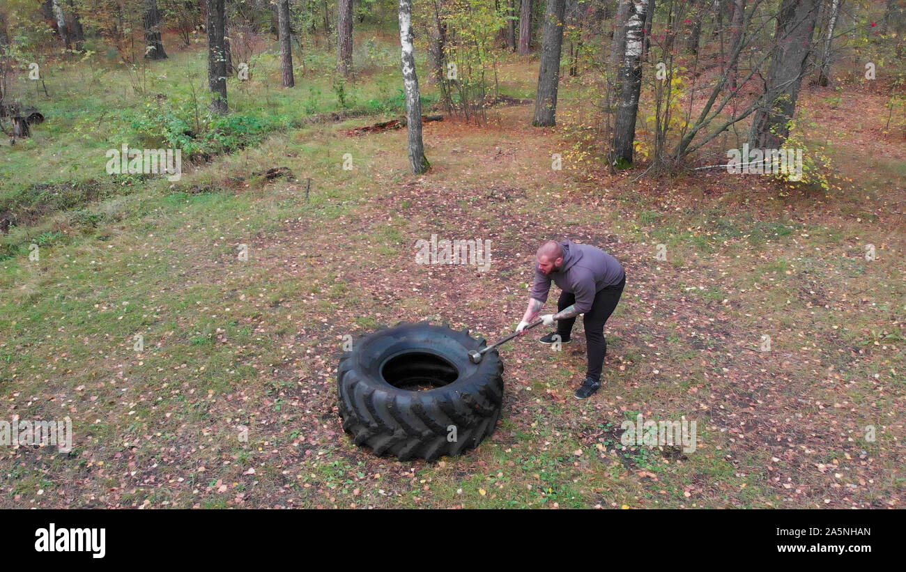 Man bodybuilder hitting truck hi-res stock photography and images - Alamy