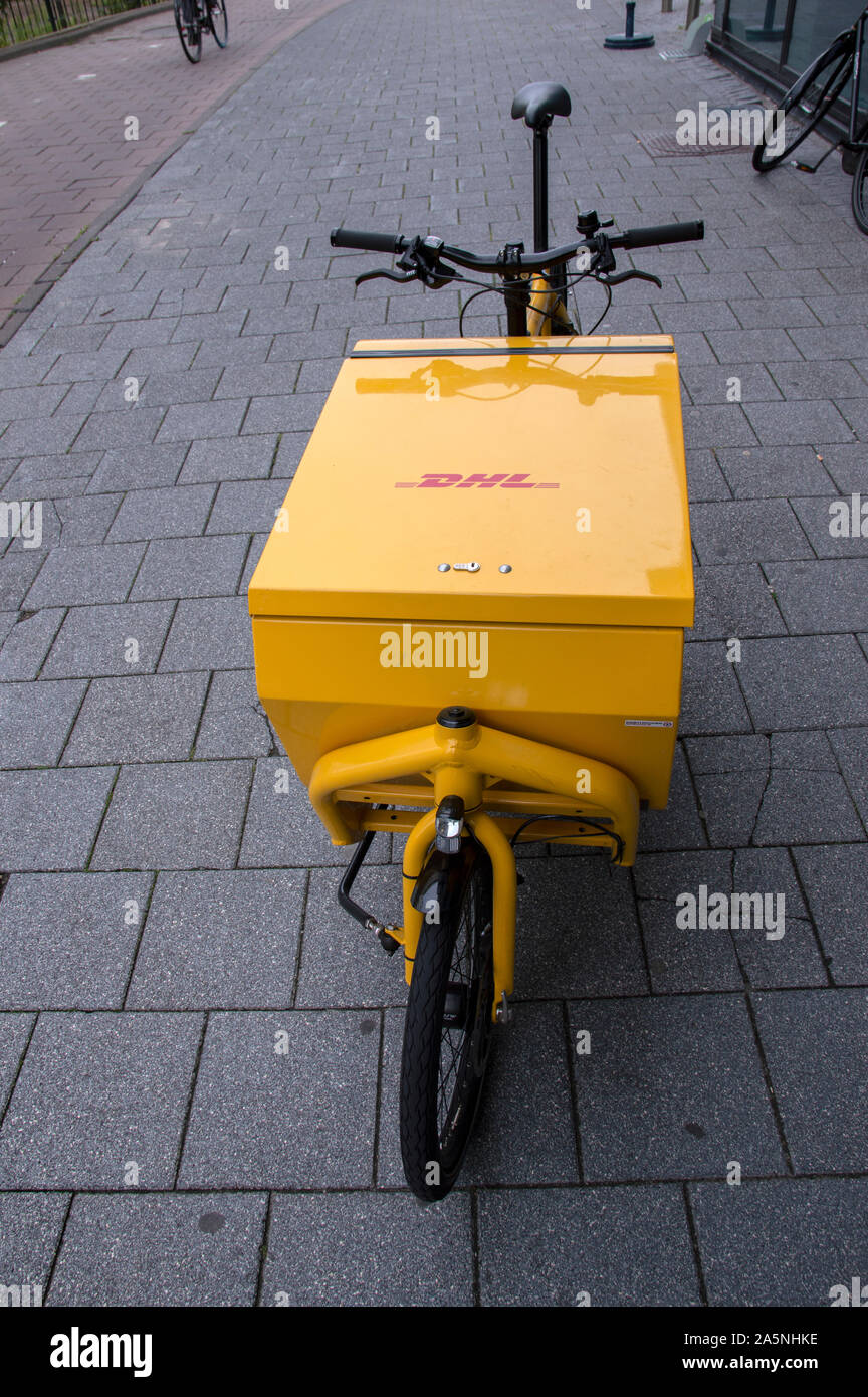 Bicycle courier dhl hi-res stock photography and images - Alamy