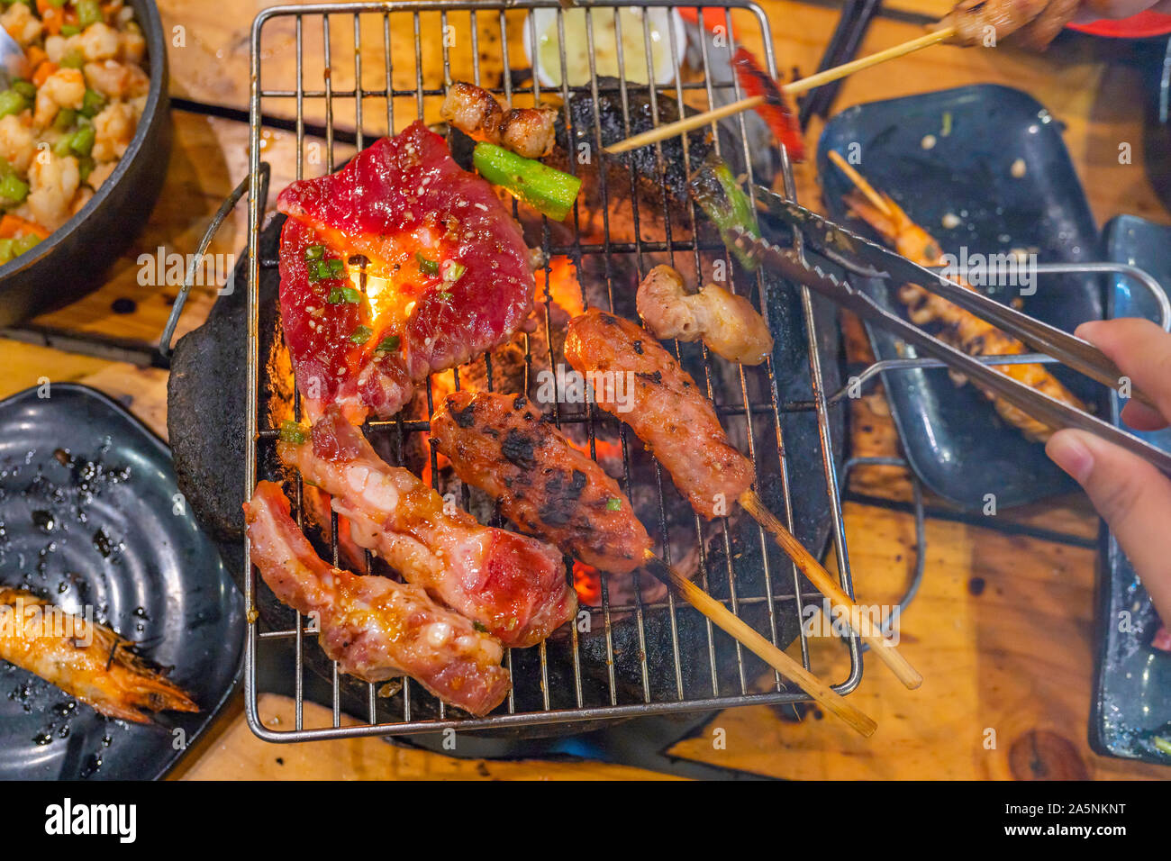 Top view photo of delicious barbecue meats on charcoal stove Stock ...