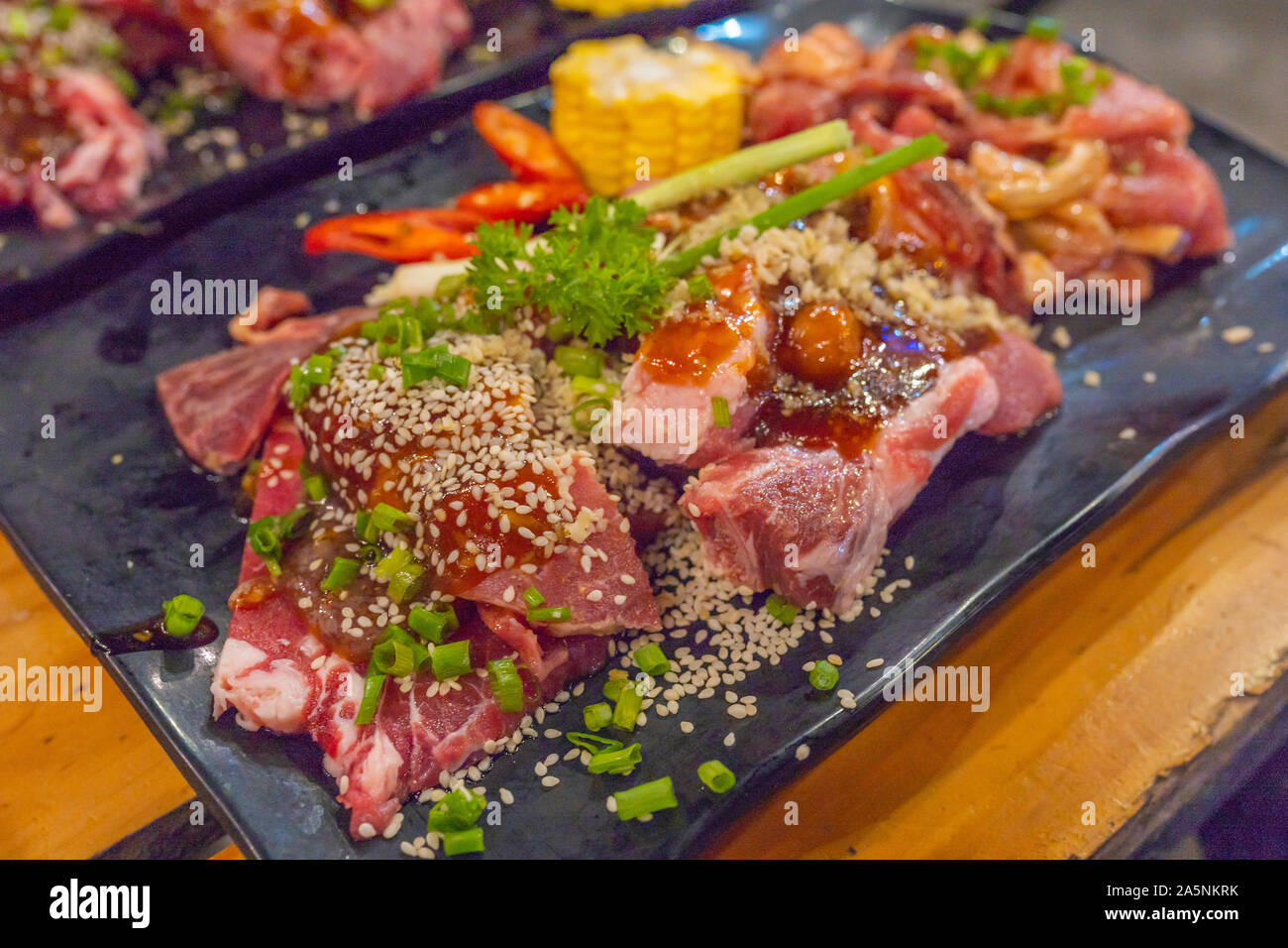 Marinated sliced beef meat hi-res stock photography and images - Alamy
