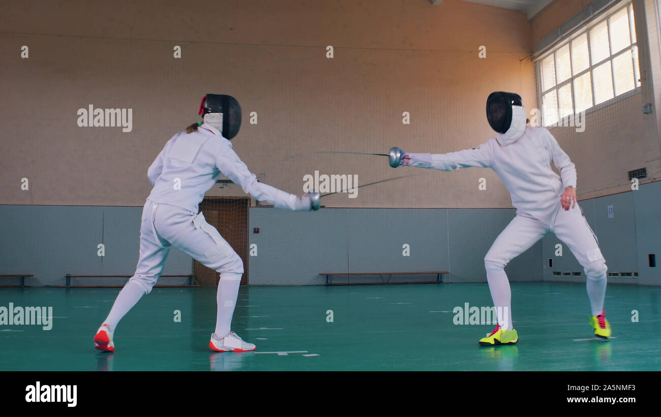 Two fencers engage hi-res stock photography and images - Alamy