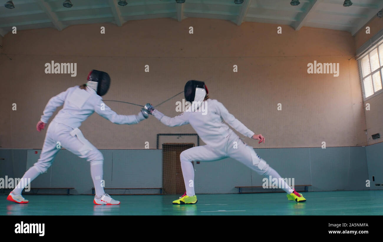 Two fencers hi-res stock photography and images - Alamy