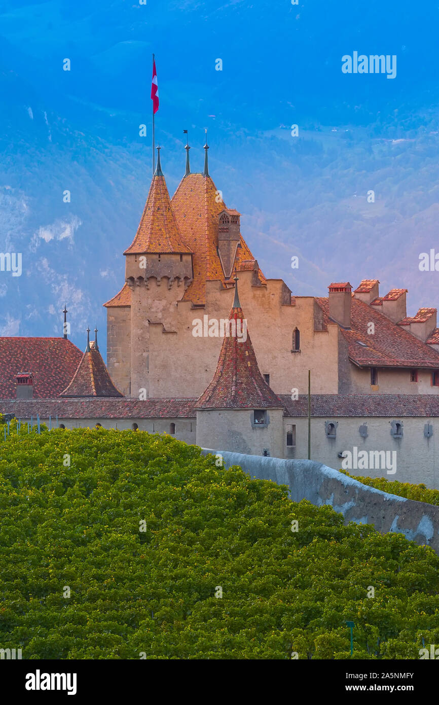 Famous castle Chateau d'Aigle among the vineyards in canton Vaud ...