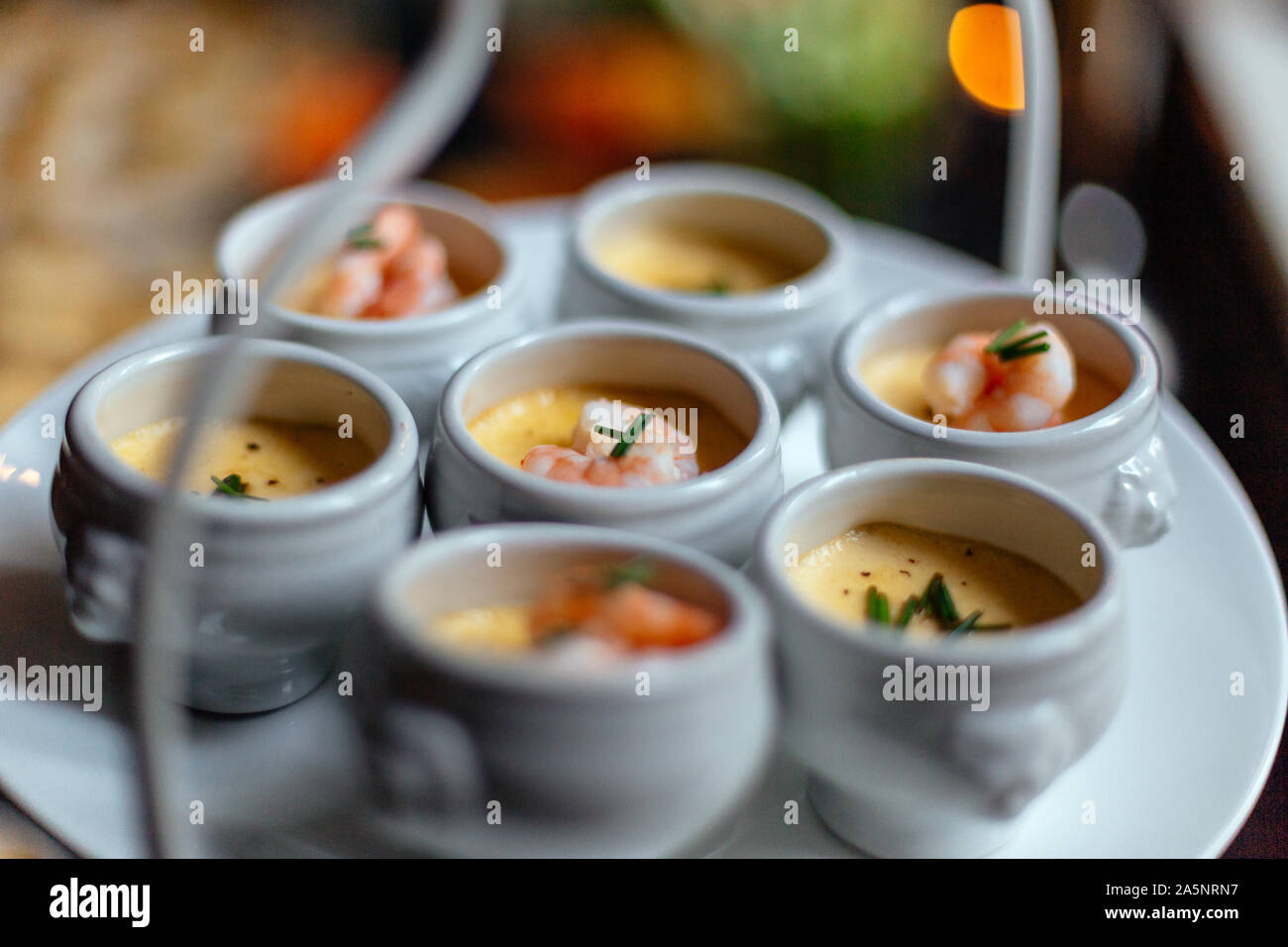 Shrimp side dishes in little cups in a cocktail party Stock Photo - Alamy
