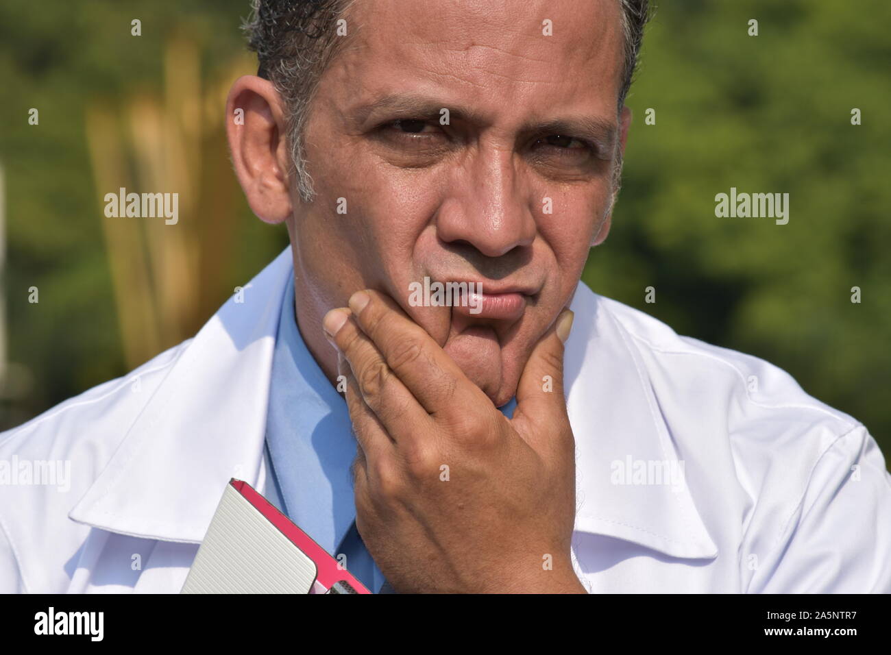 Male Doctor Thinking Stock Photo - Alamy