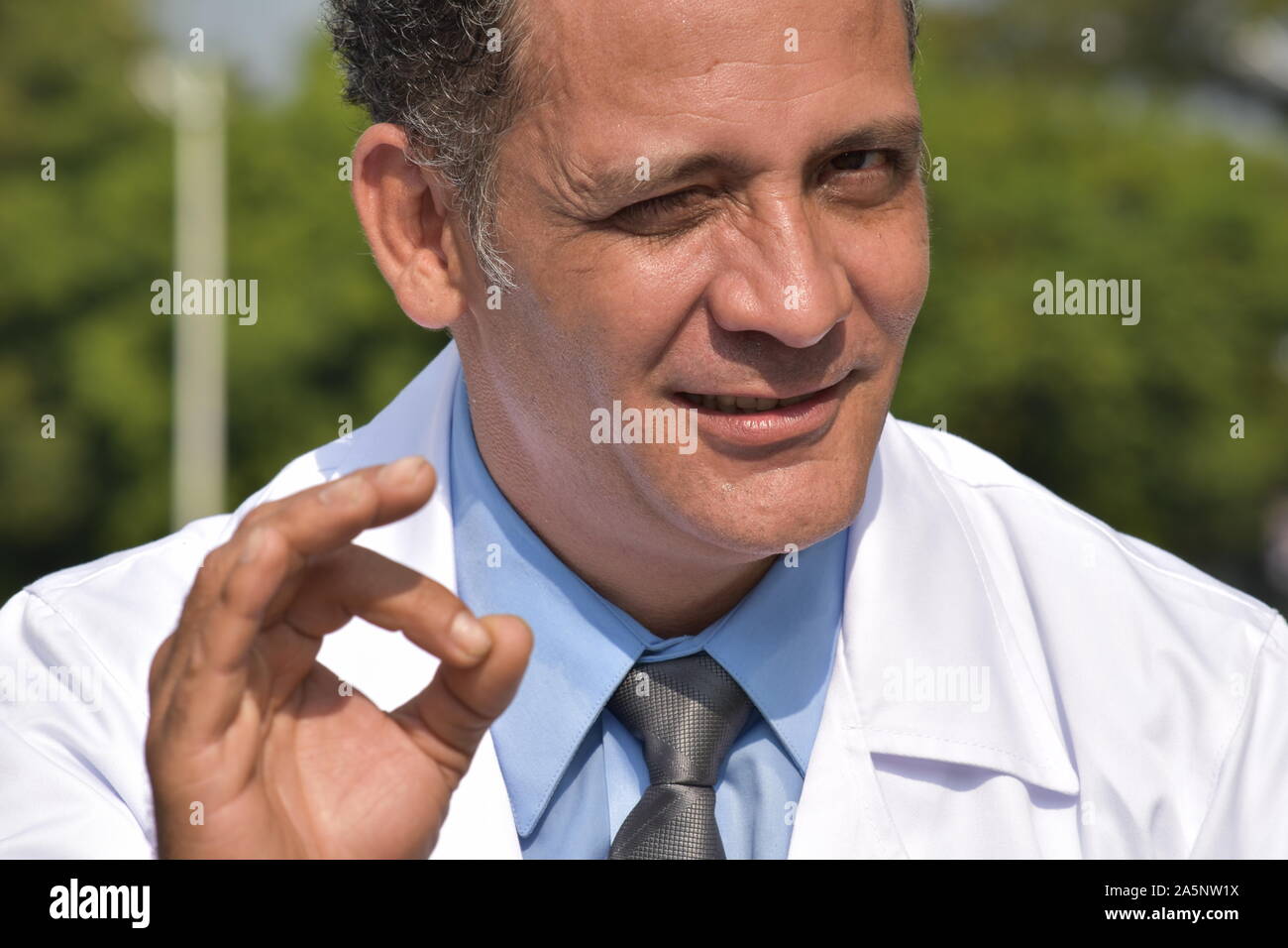 Male Doctor And Okay Sign Stock Photo - Alamy