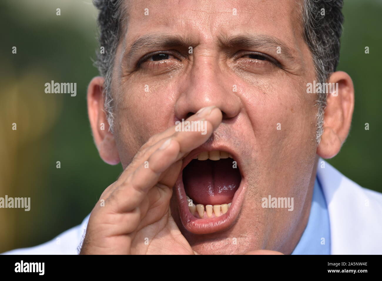 Handsome Male Doctor Shouting Wearing Lab Coat Stock Photo - Alamy