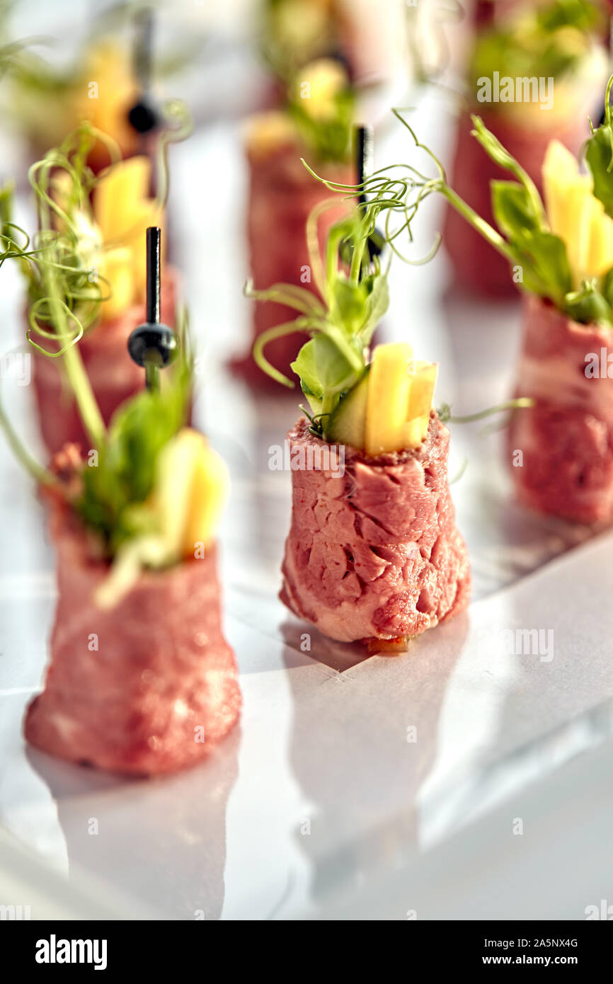 Delicious canapes beef with pineapple. Concept of food, restaurant ...