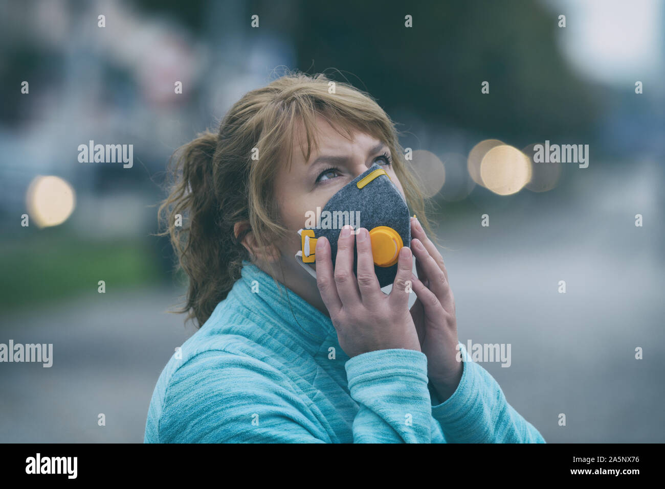 Woman wearing gas mask hi-res stock photography and images - Alamy