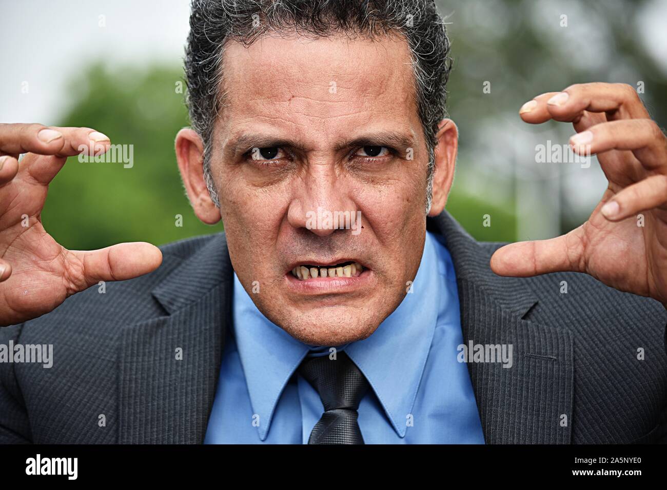 Mad Business Executive Wearing Suit Stock Photo - Alamy