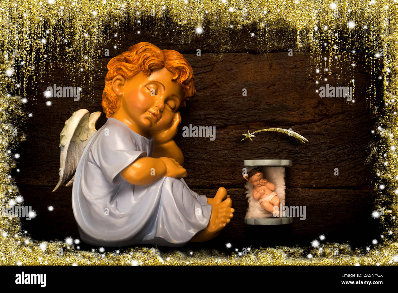 Christmas cards. Baby Jesus care by an angel in his wooden crib and ...
