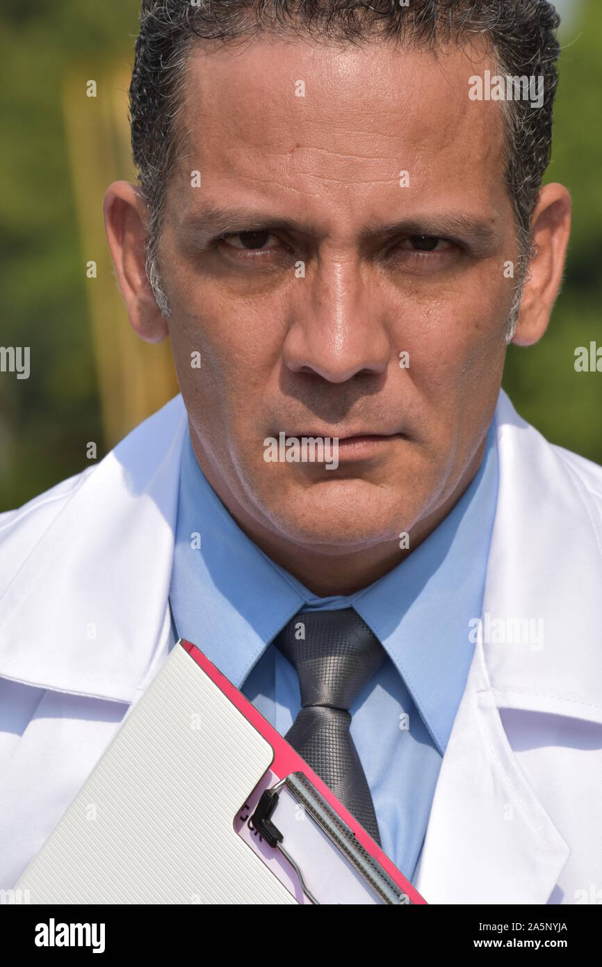 Unemotional Handsome Person Wearing Lab Coat Stock Photo - Alamy