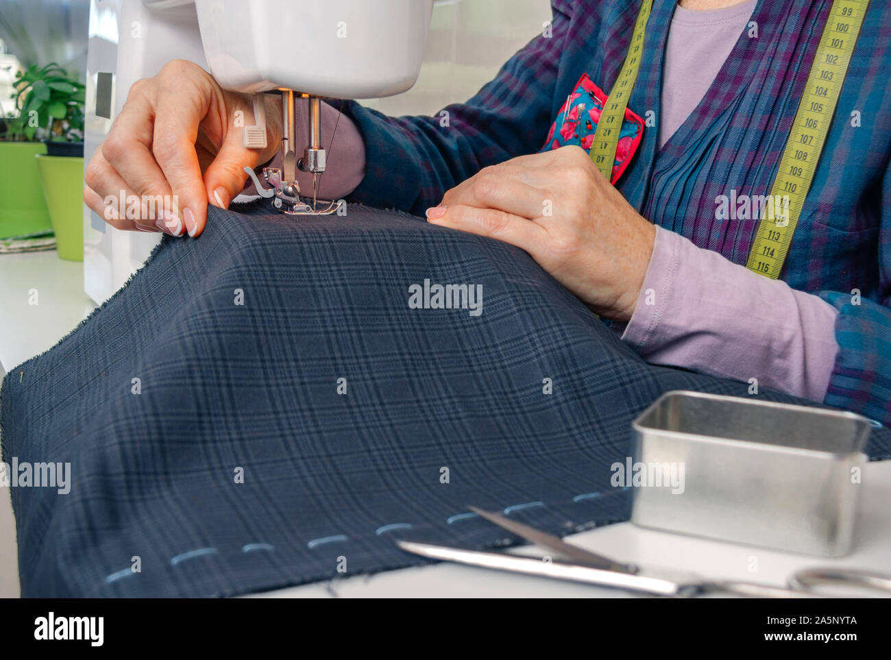 Person Working On Sewing Machine High Resolution Stock Photography and ...